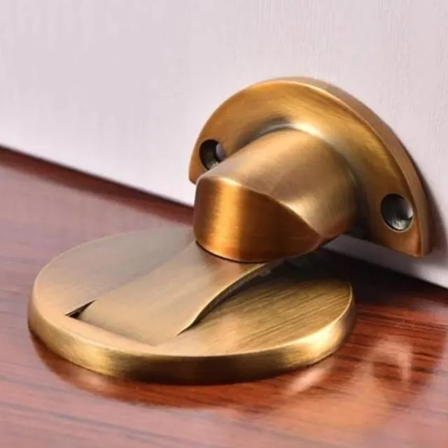 Magnetic hidden door stop · UZO