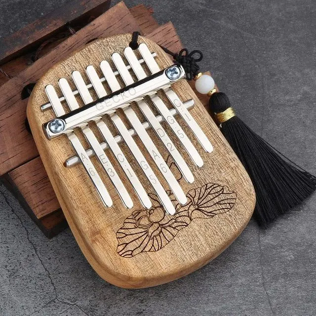 8 Key Mini Kalimba Camphor Wood or Mahagon Musical Tool · UZO