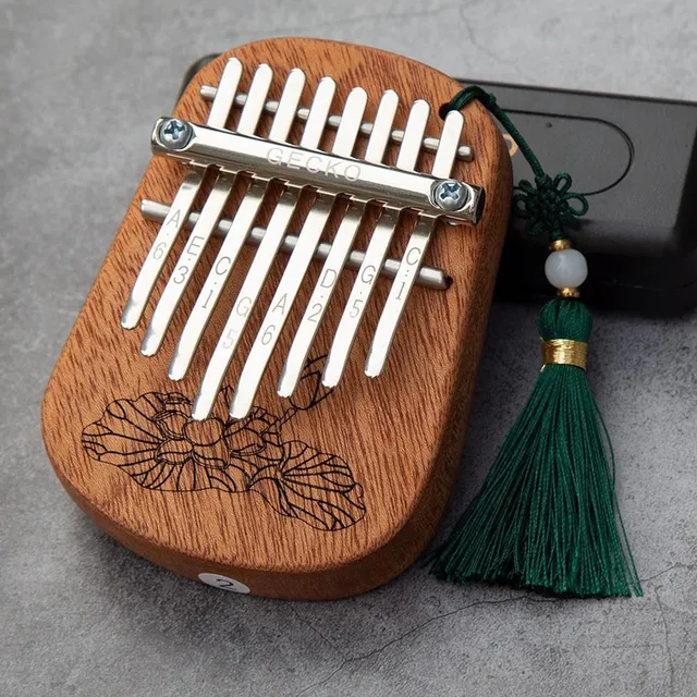 8 Key Mini Kalimba Camphor Wood or Mahagon Musical Tool · UZO